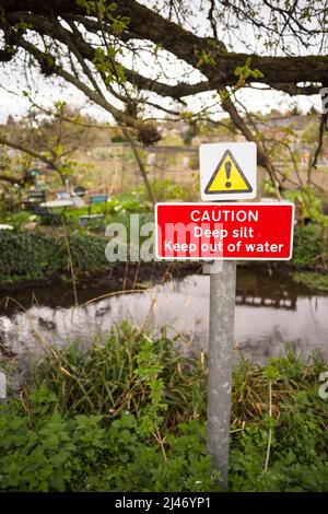 Sign danger deep water silt in river warning dangers safety notice ...
