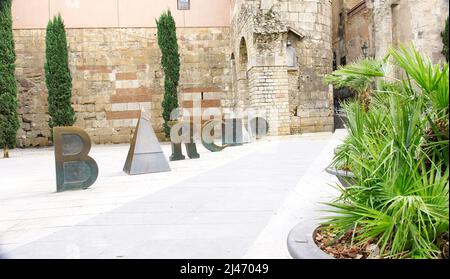 Letters forming the word BARCINO, Gothic quarter of Barcelona ...
