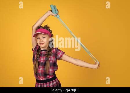 healthy sporty tween girl hold skipping rope, fitness Stock Photo - Alamy