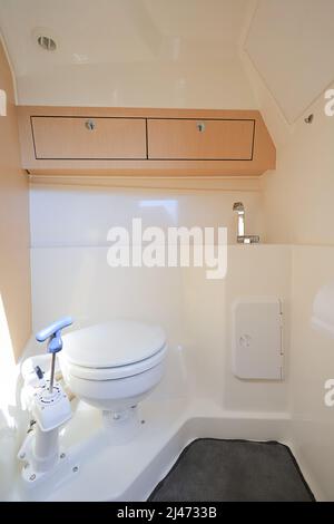 Interior restroom toilet inside motor boat Stock Photo - Alamy
