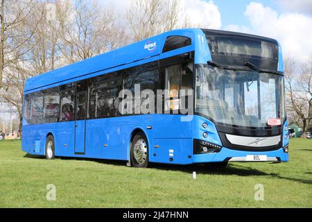 Single decker Volvo Bus in First Group livery driving along a road in ...