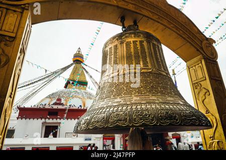Bell in the temple precinct of the Bodnath Stupa, Buddhist temple in ...