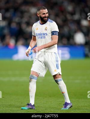 Real Madrid's Karim Benzema reacts after scoring from a penalty kick ...