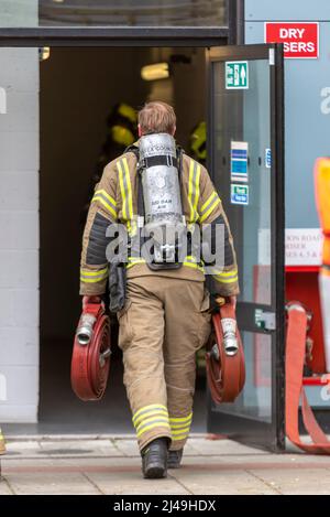 UK firefighter training in rescue techniques using ropes in Scotland ...