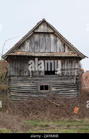 Sunja, Croatia, April 22,2022: Abandoned traditional old wooden house ...
