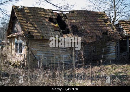 Sunja, Croatia, April 22,2022: Abandoned traditional old wooden house ...
