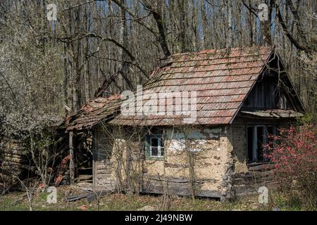 Sunja, Croatia, April 22,2022: Abandoned traditional old wooden house ...