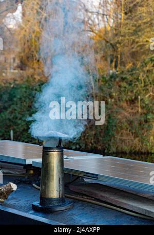 The smoke stack of a canal boat on the River Stort in Hertfordshire ...