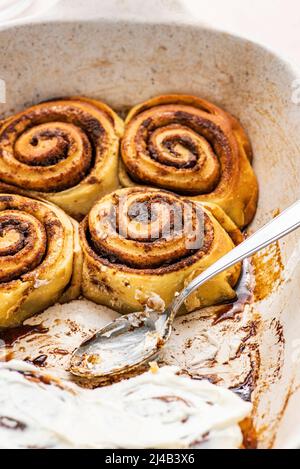 Homemade Cinnamon rolls against a pink background Stock Photo - Alamy