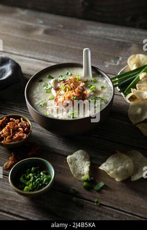 Steamy bowl of Chicken Jook in a rustic kitchen Stock Photo - Alamy