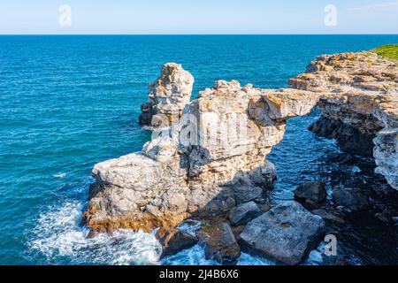 Tyulenovo rock arch on Black sea coast in Bulgaria Stock Photo - Alamy