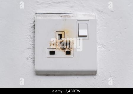 Broken electric socket Stock Photo - Alamy