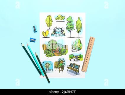 Paper sheet with sketches for landscape design and stationery on color ...