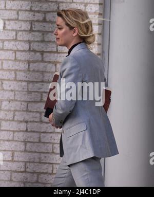 Amber Heard departs after her trial recessed for the day at the Fairfax ...
