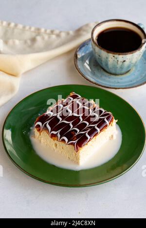 Caramel trilece cake. Trilece cake on a white background. . Bakery ...