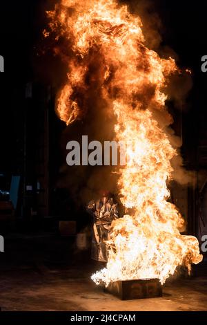 Firefighter extinguishes a heptane 2B-Pan fire with a 2-BTP ...