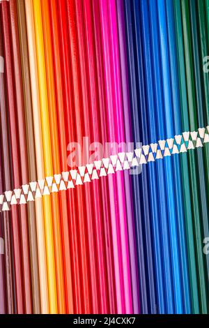 Background of triangular colored pencils Stock Photo - Alamy