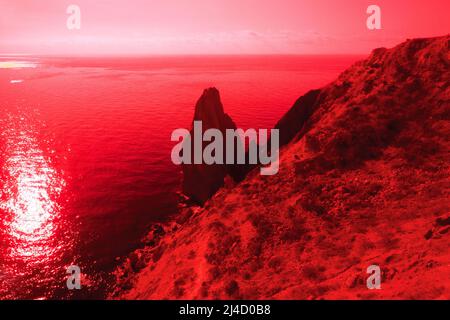 Damn finger, finger-stone coastal vertical rock. Fantasy in blue-red ...