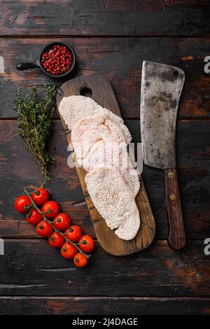 Raw schnitzel chicken meat set, on white stone table background, top ...