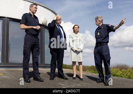 Natalie Elphicke, MP for Dover, (right) listens to Prime Minister Rishi ...