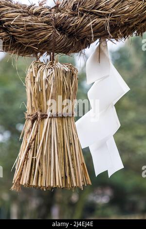 Shide paper streamer used in Shinto rituals, Beppu Benten Pond, Japan ...