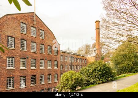 Dunham Massey red brick textile mill building and chimney Stock Photo ...