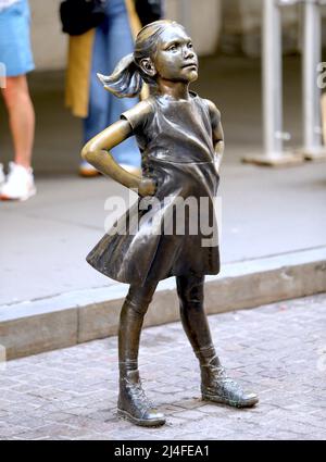 Famous fearless girl statue by Kristen Visbal next to the New York ...