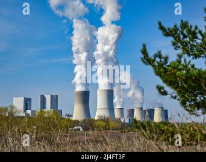 Boxberg, Germany. 14th Apr, 2022. Steam rises from the cooling towers ...