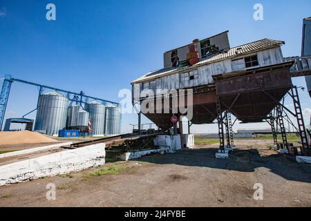 Old outdated Soviet grain storage. Cone hopper for truck loading ...