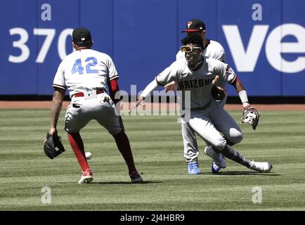 Arizona Diamondbacks' Geraldo Perdomo, right, is congratulated by Tim ...