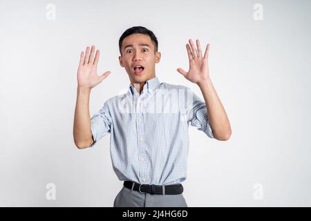asian young young man with scared gesture on isolated Stock Photo - Alamy