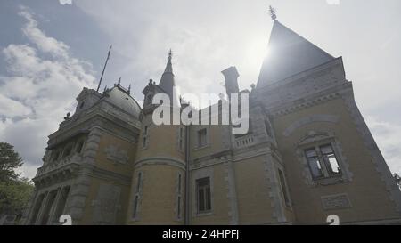 Bottom view of old country palace. Action. Beautiful architecture of ...