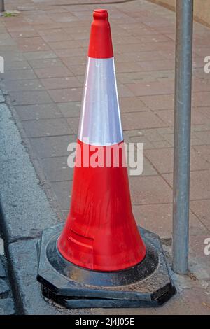 Orange traffic reflective bollards. Traffic Sign or traffic pole on the ...