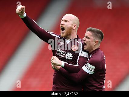 Heart of Midlothian's Cameron Devlin (left) is fouled by Livingston's ...