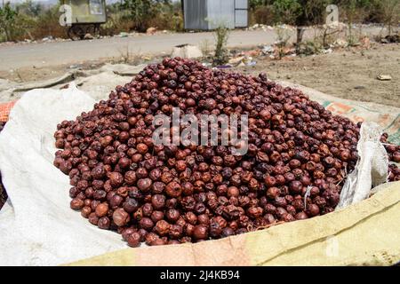 Fruits and vegetables are sold at the weekly market in the town of ...
