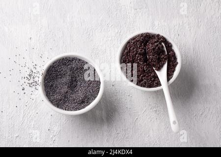 Ingredients for poppy milk. poppy seeds dry and soaked, water in bottle ...