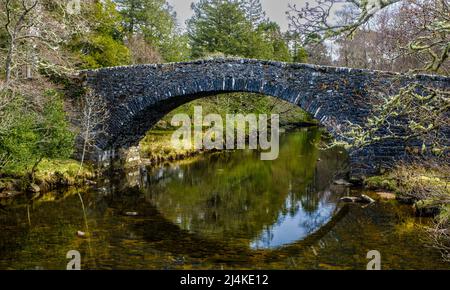 The bridge over the River Moidart flowing out to Loch Moidart in Autumn ...