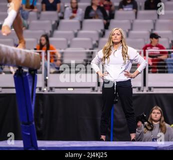 Oklahoma head gymnastics coach K.J. Kindler talks with Meilin Sullivan ...