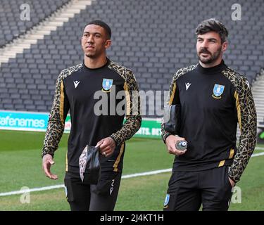 Milton Keynes Dons' Callum Paterson (third right) celebrates after ...