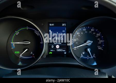 A self charging hybrid dashboard instrument panel showing the car fuel ...