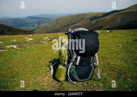 pilgrim's backpack with a tent on the way to santiago Stock Photo - Alamy
