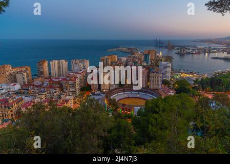 Sunset aerial view of the corrida building in the spanish city malaga ...