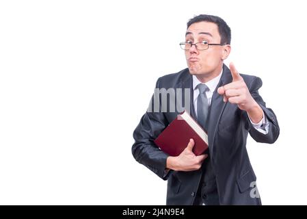 Angry teacher with book in light studio Stock Photo - Alamy