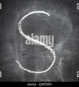 J - letter written on black chalkboard Stock Photo - Alamy