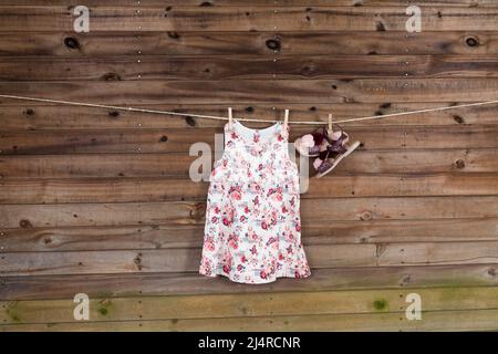 Children's fashion set of girls clothing, dress with sandals; Photo on ...