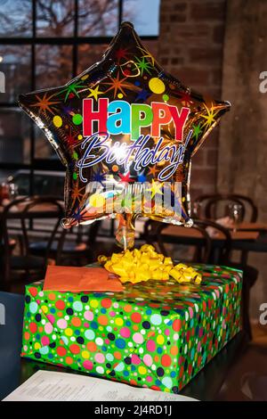 Closeup of colorful balloons with blurred background Stock Photo - Alamy
