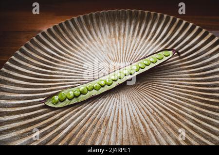 One Guaje seed pod on a plate in Oaxaca, Mexico Stock Photo - Alamy