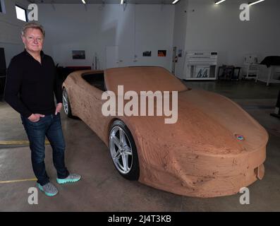 Henrik Fisker with a clay design study for an all electric sports car ...