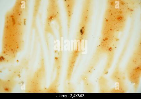 food stain left after eat on dish in white background Stock Photo - Alamy