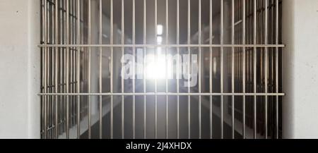 Prison building corridor, jail cell and open metal bars door, empty ...